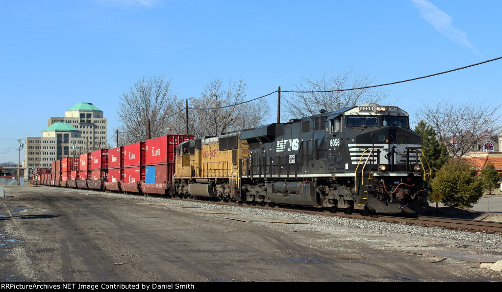 NS 8058 leads 25A south-bound Stack Train.